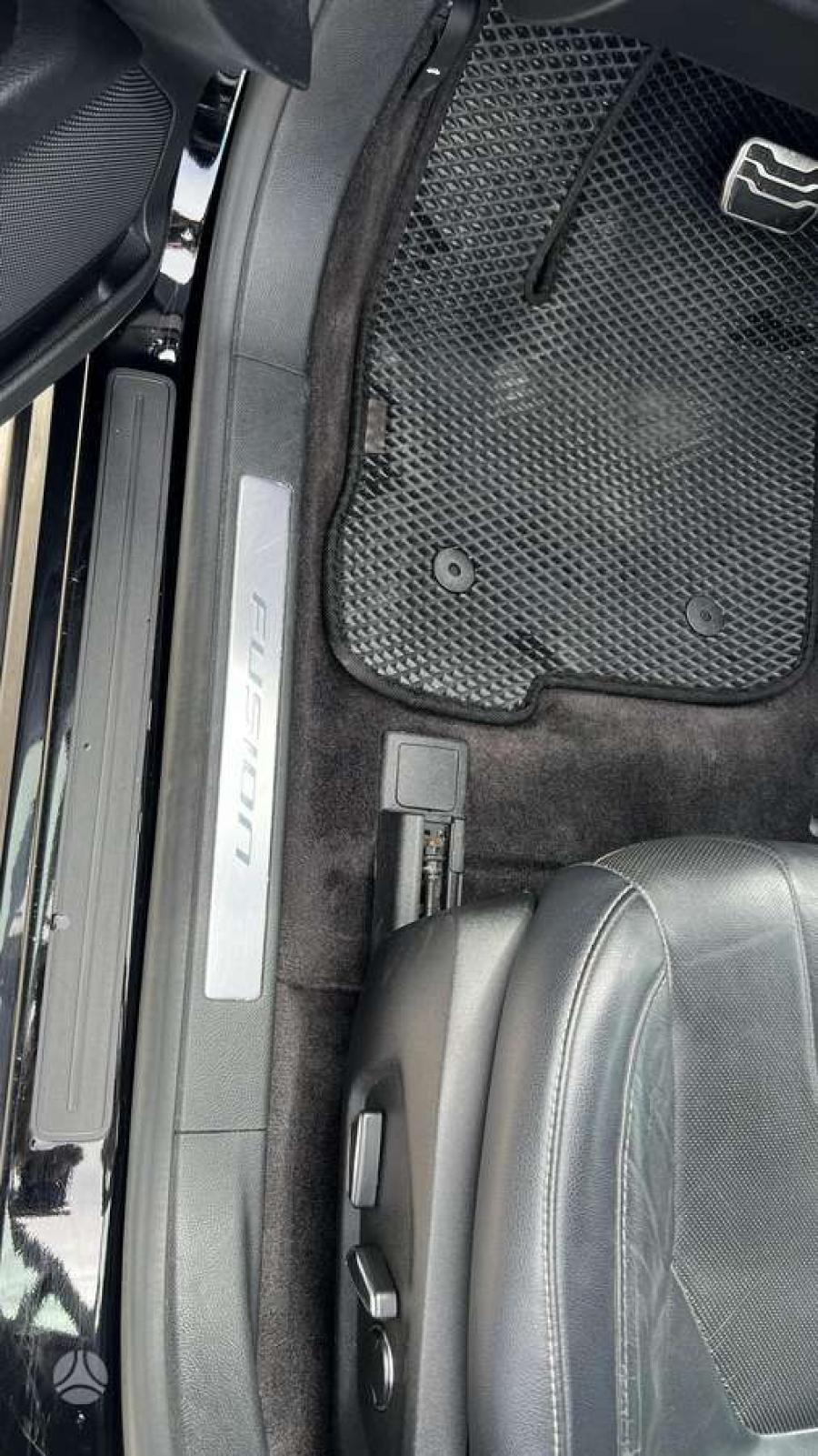 Black Ford Fusion 2017 in Vilnius, with an engine capacity of 2.00 L and mileage of 139 thousand km for 10500 €, photo 21 on AUTOMOTO.COM.LV