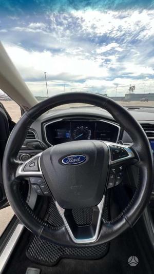 Black Ford Fusion 2017 in Vilnius, with an engine capacity of 2.00 L and mileage of 139 thousand km for 10500 €, photo 22 on AUTOMOTO.COM.LV