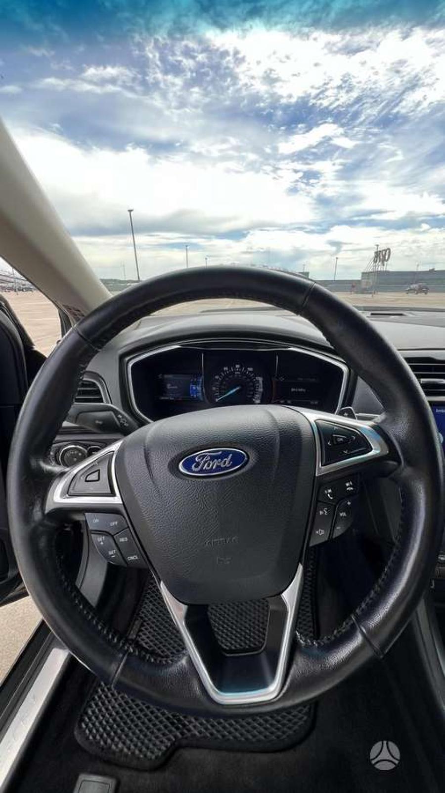 Black Ford Fusion 2017 in Vilnius, with an engine capacity of 2.00 L and mileage of 139 thousand km for 10500 €, photo 22 on AUTOMOTO.COM.LV