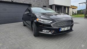 Black Ford Fusion 2017 in Vilnius, with an engine capacity of 2.00 L and mileage of 187 thousand km for 9400 €, photo  on AUTOMOTO.COM.LV