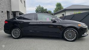 Black Ford Fusion 2017 in Vilnius, with an engine capacity of 2.00 L and mileage of 187 thousand km for 9400 €, photo 4 on AUTOMOTO.COM.LV