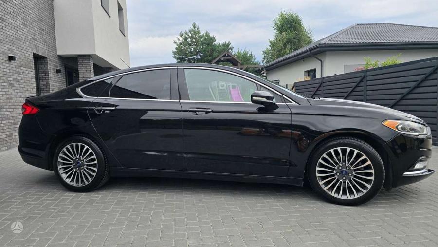 Black Ford Fusion 2017 in Vilnius, with an engine capacity of 2.00 L and mileage of 187 thousand km for 9400 €, photo 4 on AUTOMOTO.COM.LV