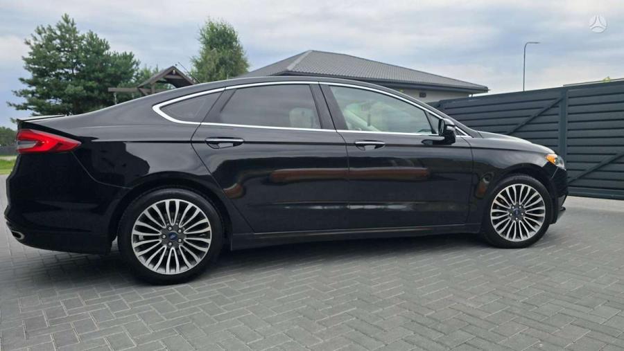 Black Ford Fusion 2017 in Vilnius, with an engine capacity of 2.00 L and mileage of 187 thousand km for 9400 €, photo 5 on AUTOMOTO.COM.LV