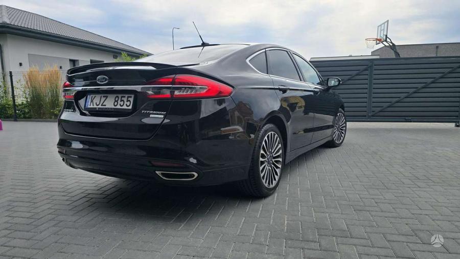 Black Ford Fusion 2017 in Vilnius, with an engine capacity of 2.00 L and mileage of 187 thousand km for 9400 €, photo 6 on AUTOMOTO.COM.LV