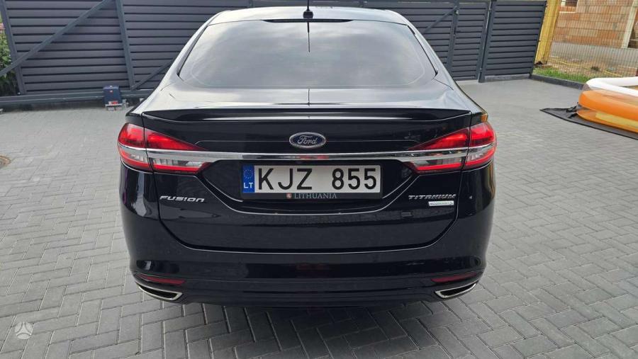Black Ford Fusion 2017 in Vilnius, with an engine capacity of 2.00 L and mileage of 187 thousand km for 9400 €, photo 8 on AUTOMOTO.COM.LV