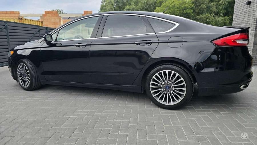 Black Ford Fusion 2017 in Vilnius, with an engine capacity of 2.00 L and mileage of 187 thousand km for 9400 €, photo 10 on AUTOMOTO.COM.LV