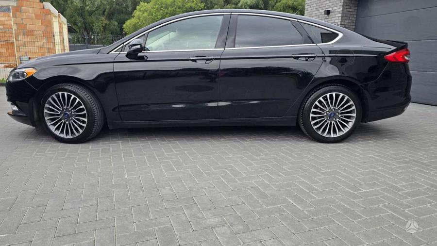 Black Ford Fusion 2017 in Vilnius, with an engine capacity of 2.00 L and mileage of 187 thousand km for 9400 €, photo 11 on AUTOMOTO.COM.LV