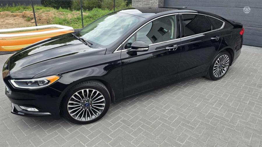 Black Ford Fusion 2017 in Vilnius, with an engine capacity of 2.00 L and mileage of 187 thousand km for 9400 €, photo 12 on AUTOMOTO.COM.LV