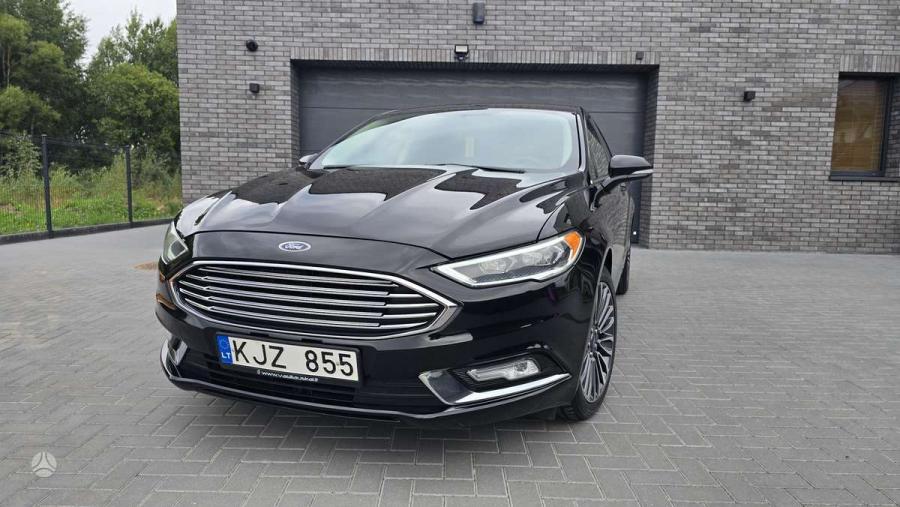 Black Ford Fusion 2017 in Vilnius, with an engine capacity of 2.00 L and mileage of 187 thousand km for 9400 €, photo 14 on AUTOMOTO.COM.LV