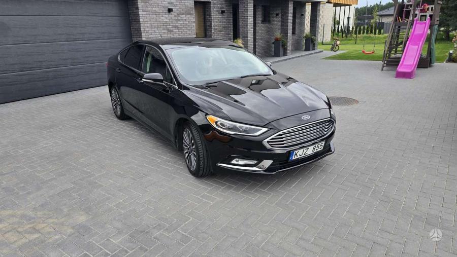 Black Ford Fusion 2017 in Vilnius, with an engine capacity of 2.00 L and mileage of 187 thousand km for 9400 €, photo 15 on AUTOMOTO.COM.LV