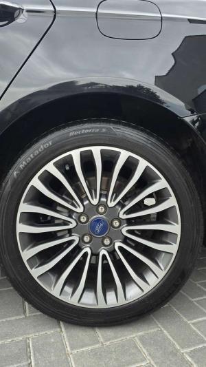 Black Ford Fusion 2017 in Vilnius, with an engine capacity of 2.00 L and mileage of 187 thousand km for 9400 €, photo 16 on AUTOMOTO.COM.LV