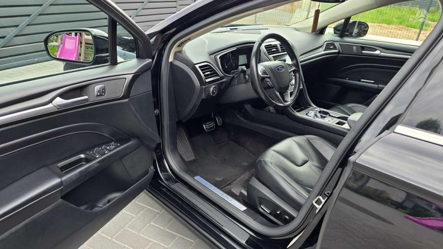 Black Ford Fusion 2017 in Vilnius, with an engine capacity of 2.00 L and mileage of 187 thousand km for 9400 €, photo 21 on AUTOMOTO.COM.LV