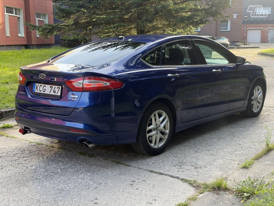 Blue Ford Fusion 2014 in Vilnius, with an engine capacity of 1.60 L and mileage of 229 thousand km for 3499 €, photo 5 on AUTOMOTO.COM.LV