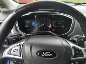 Blue Ford Fusion 2016 in Klaipeda, with an engine capacity of 2.00 L and mileage of 214 thousand km for 6800 €, photo 20 on AUTOMOTO.COM.LV