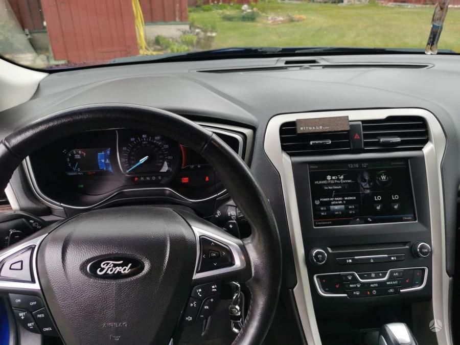 Blue Ford Fusion 2016 in Klaipeda, with an engine capacity of 2.00 L and mileage of 214 thousand km for 6800 €, photo 21 on AUTOMOTO.COM.LV