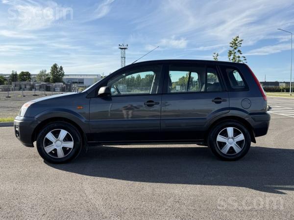 Grey Ford Fusion 2006 in Liepaja, with an engine capacity of 1.40 L and mileage of 203 thousand km for 2490 €, photo 6 on AUTOMOTO.COM.LV