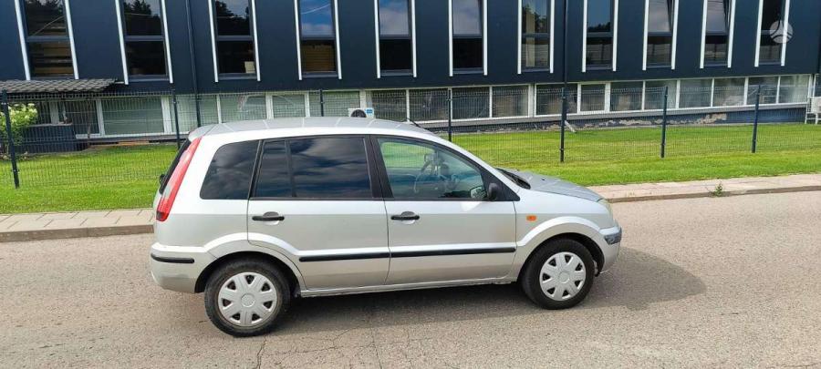 Grey Ford Fusion 2006 in Vilnius, with an engine capacity of 1.40 L and mileage of 232 thousand km for 1250 €, photo 4 on AUTOMOTO.COM.LV