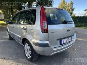 Grey Ford Fusion 2008 in Riga, with an engine capacity of 1.40 L and mileage of 190 thousand km for 2990 €, photo 4 on AUTOMOTO.COM.LV