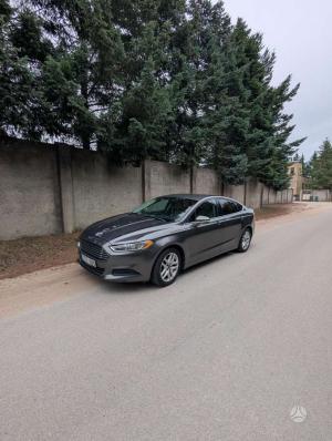 Pelēks Ford Fusion 2014 Kauņa, ar dzinēja tilpumu 2.50 L un nobraukumu 242 tūkst. km par 4999 €, foto  vietnē AUTOMOTO.COM.LV