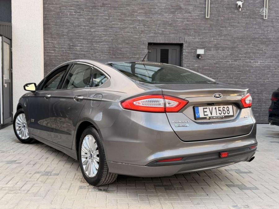 Grey Ford Fusion 2014 in Vilnius, with an engine capacity of 2.00 L and mileage of 312 thousand km for 5700 €, photo 5 on AUTOMOTO.COM.LV