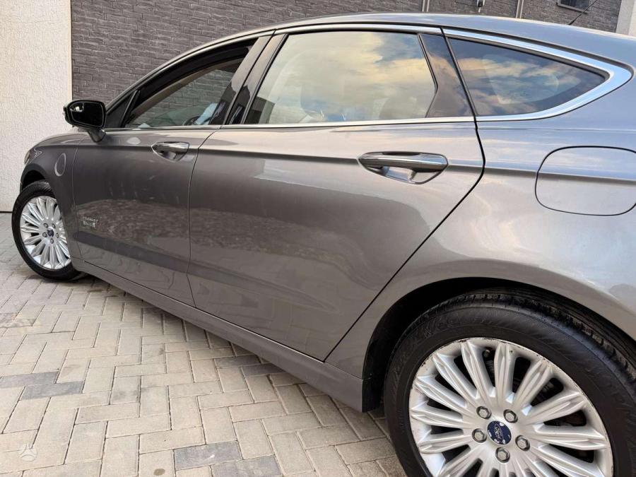 Grey Ford Fusion 2014 in Vilnius, with an engine capacity of 2.00 L and mileage of 312 thousand km for 5700 €, photo 9 on AUTOMOTO.COM.LV