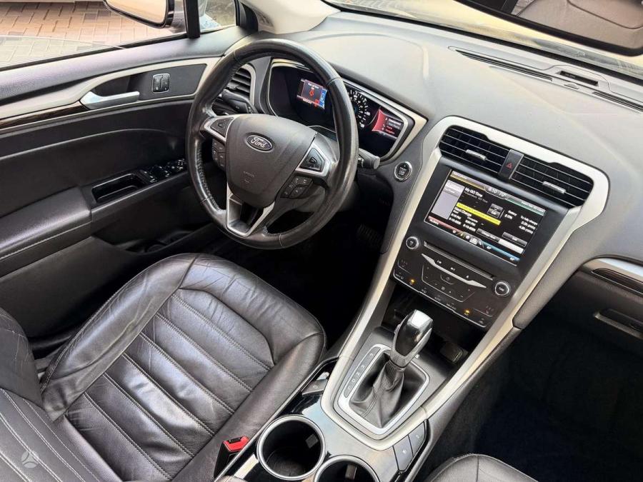 Grey Ford Fusion 2014 in Vilnius, with an engine capacity of 2.00 L and mileage of 312 thousand km for 5700 €, photo 12 on AUTOMOTO.COM.LV