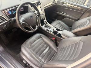 Grey Ford Fusion 2014 in Vilnius, with an engine capacity of 2.00 L and mileage of 312 thousand km for 5700 €, photo 13 on AUTOMOTO.COM.LV