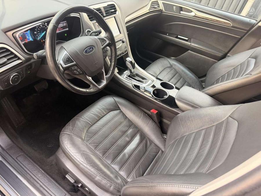 Grey Ford Fusion 2014 in Vilnius, with an engine capacity of 2.00 L and mileage of 312 thousand km for 5700 €, photo 13 on AUTOMOTO.COM.LV
