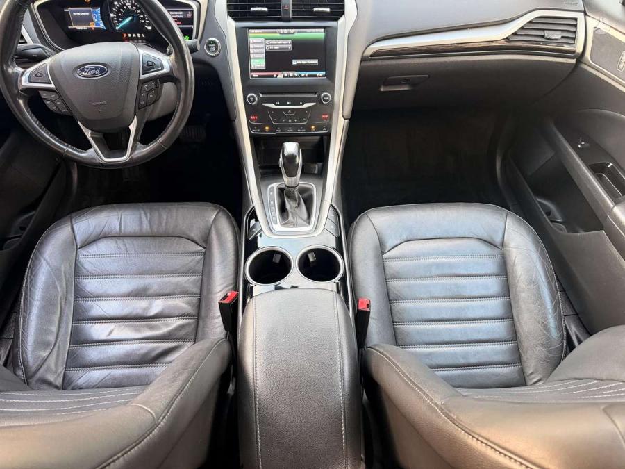 Grey Ford Fusion 2014 in Vilnius, with an engine capacity of 2.00 L and mileage of 312 thousand km for 5700 €, photo 15 on AUTOMOTO.COM.LV