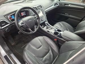Grey Ford Fusion 2015 in Silute, with an engine capacity of 2.00 L and mileage of 195 thousand km for 4750 €, photo 11 on AUTOMOTO.COM.LV