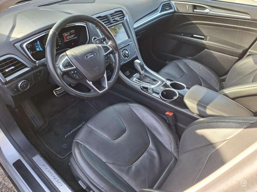 Grey Ford Fusion 2015 in Silute, with an engine capacity of 2.00 L and mileage of 195 thousand km for 4750 €, photo 12 on AUTOMOTO.COM.LV