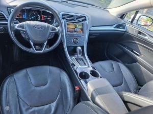 Grey Ford Fusion 2015 in Silute, with an engine capacity of 2.00 L and mileage of 195 thousand km for 4750 €, photo 14 on AUTOMOTO.COM.LV