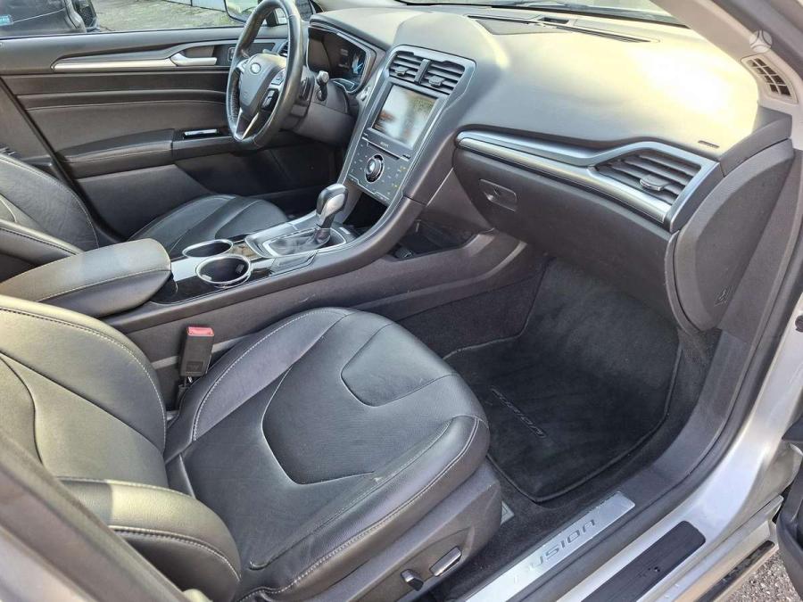 Grey Ford Fusion 2015 in Silute, with an engine capacity of 2.00 L and mileage of 195 thousand km for 4750 €, photo 15 on AUTOMOTO.COM.LV