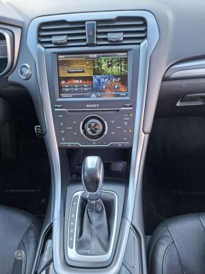 Grey Ford Fusion 2015 in Silute, with an engine capacity of 2.00 L and mileage of 195 thousand km for 4750 €, photo 16 on AUTOMOTO.COM.LV