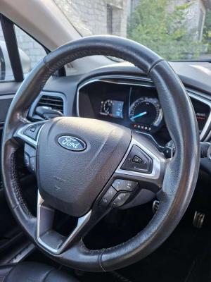 Grey Ford Fusion 2015 in Silute, with an engine capacity of 2.00 L and mileage of 195 thousand km for 4750 €, photo 18 on AUTOMOTO.COM.LV