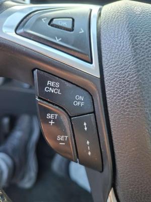 Grey Ford Fusion 2015 in Silute, with an engine capacity of 2.00 L and mileage of 195 thousand km for 4750 €, photo 24 on AUTOMOTO.COM.LV