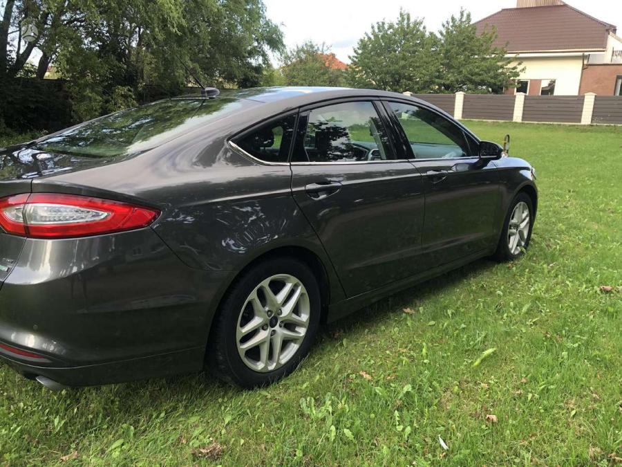 Grey Ford Fusion 2016 in Klaipeda, with an engine capacity of 1.50 L and mileage of 100 thousand km for 6500 €, photo 4 on AUTOMOTO.COM.LV