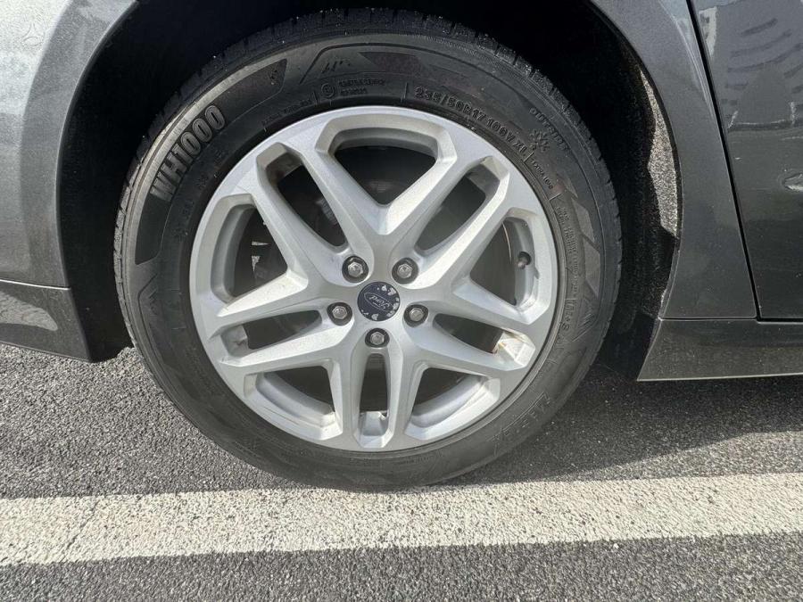 Grey Ford Fusion 2016 in Vilnius, with an engine capacity of 2.49 L and mileage of 112 thousand km for 7200 €, photo 11 on AUTOMOTO.COM.LV