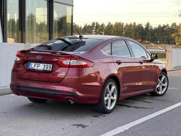 Sarkans Ford Fusion 2013 Kauņa, ar dzinēja tilpumu 1.60 L un nobraukumu 203 tūkst. km par 6400 €, foto 4 vietnē AUTOMOTO.COM.LV