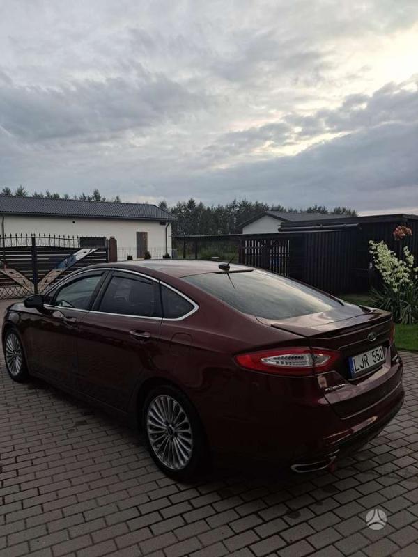 Red Ford Fusion 2015 in Gargzdai, with an engine capacity of 2.00 L and mileage of 220 thousand km for 7000 €, photo 3 on AUTOMOTO.COM.LV