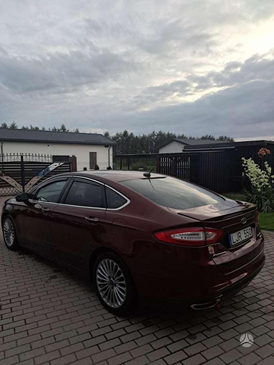 Red Ford Fusion 2015 in Gargzdai, with an engine capacity of 2.00 L and mileage of 220 thousand km for 7000 €, photo 4 on AUTOMOTO.COM.LV