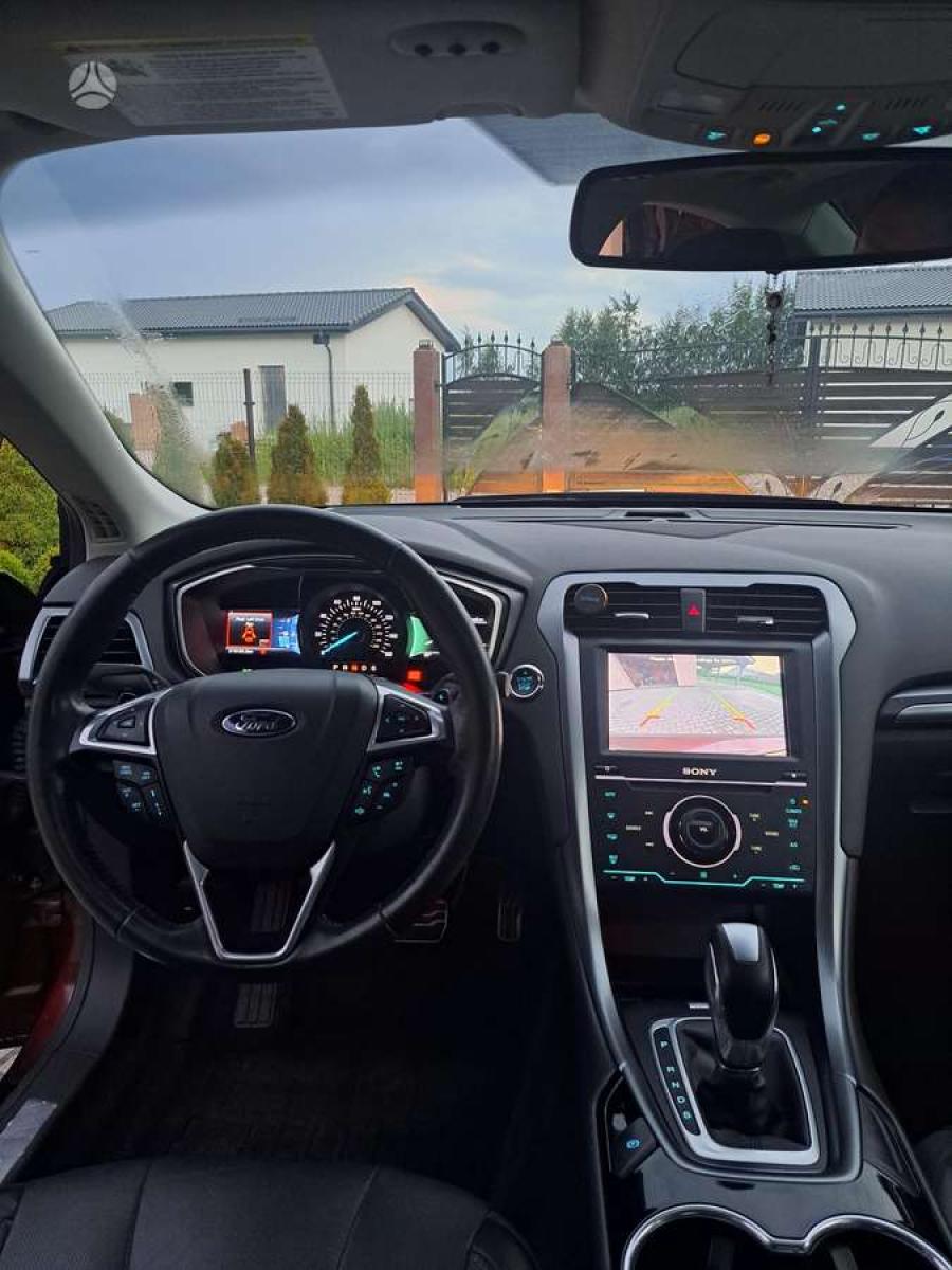 Red Ford Fusion 2015 in Gargzdai, with an engine capacity of 2.00 L and mileage of 220 thousand km for 7000 €, photo 7 on AUTOMOTO.COM.LV