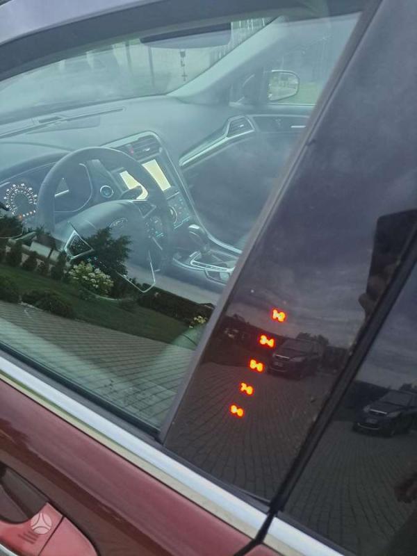 Red Ford Fusion 2015 in Gargzdai, with an engine capacity of 2.00 L and mileage of 220 thousand km for 7000 €, photo 10 on AUTOMOTO.COM.LV