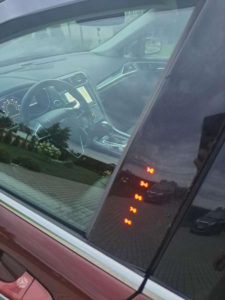 Red Ford Fusion 2015 in Gargzdai, with an engine capacity of 2.00 L and mileage of 220 thousand km for 7000 €, photo 11 on AUTOMOTO.COM.LV