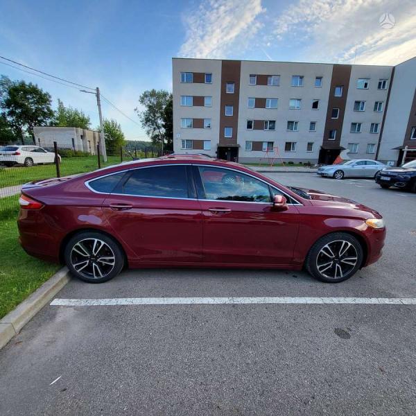 Red Ford Fusion 2016 in Vilnius, with an engine capacity of 2.00 L and mileage of 187 thousand km for 11499 €, photo 5 on AUTOMOTO.COM.LV