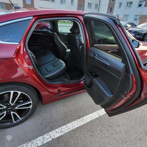 Red Ford Fusion 2016 in Vilnius, with an engine capacity of 2.00 L and mileage of 187 thousand km for 11499 €, photo 9 on AUTOMOTO.COM.LV