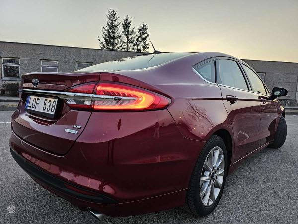 Red Ford Fusion 2017 in Siauliai, with an engine capacity of 1.50 L and mileage of 265 thousand km for 7300 €, photo 11 on AUTOMOTO.COM.LV
