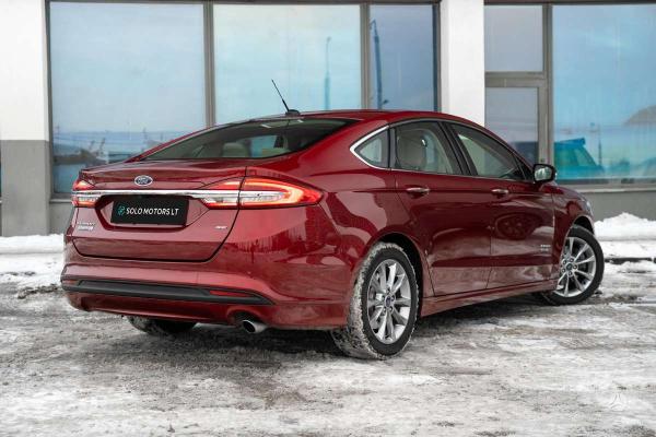 Red Ford Fusion 2017 in Vilnius, with an engine capacity of 2.00 L and mileage of 102 thousand km for 10950 €, photo 4 on AUTOMOTO.COM.LV
