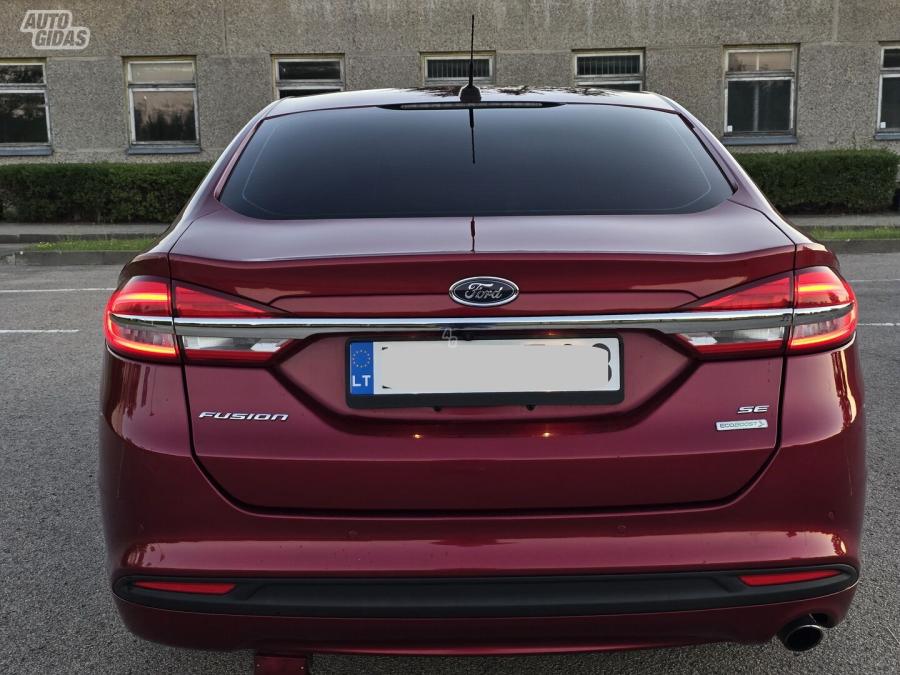 Red Ford Fusion 2017 in Siauliai, with an engine capacity of 1.50 L and mileage of 281 thousand km for 5750 €, photo 12 on AUTOMOTO.COM.LV