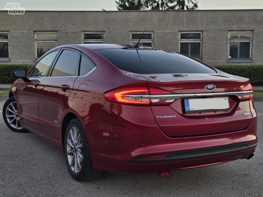 Red Ford Fusion 2017 in Siauliai, with an engine capacity of 1.50 L and mileage of 281 thousand km for 5750 €, photo 13 on AUTOMOTO.COM.LV